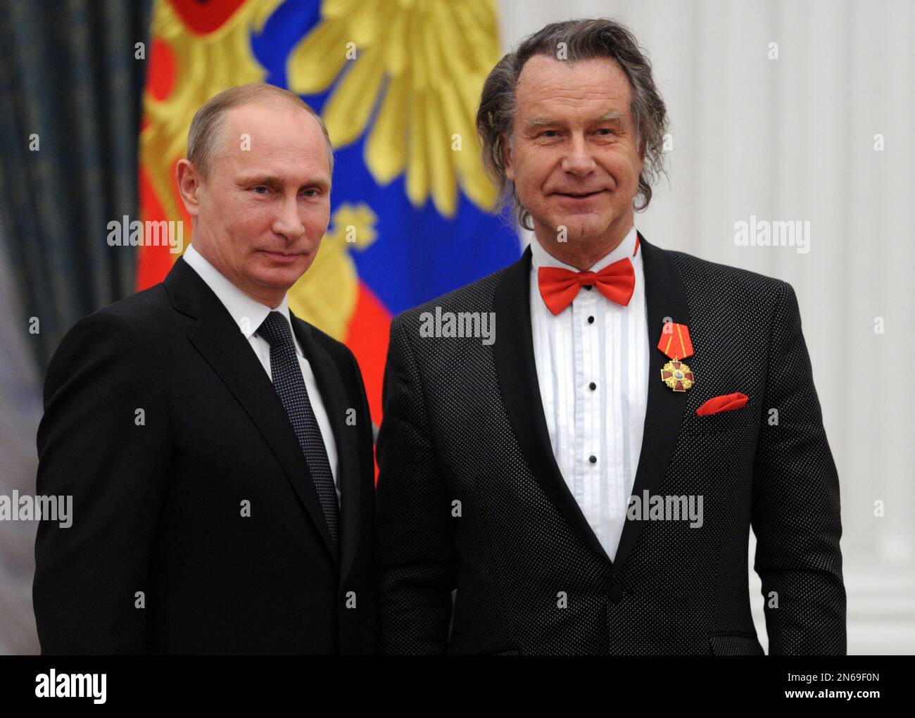 Russian President Vladimir Putin poses for a photo with famous Russian ...