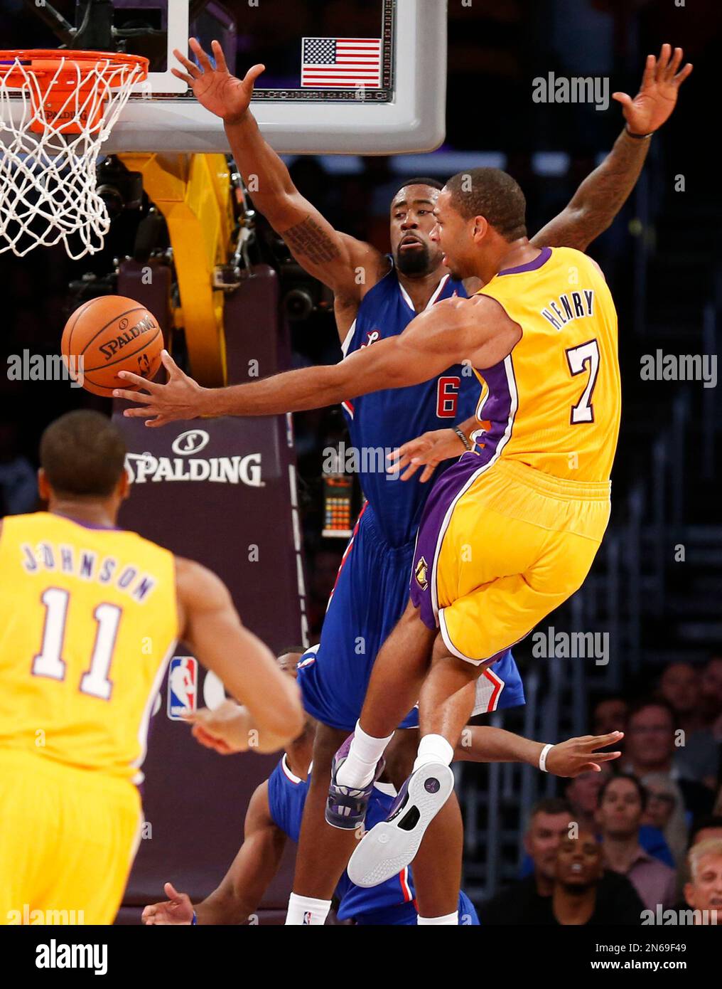 Los Angeles Lakers' Xavier Henry passes off the ball as Los Angeles ...