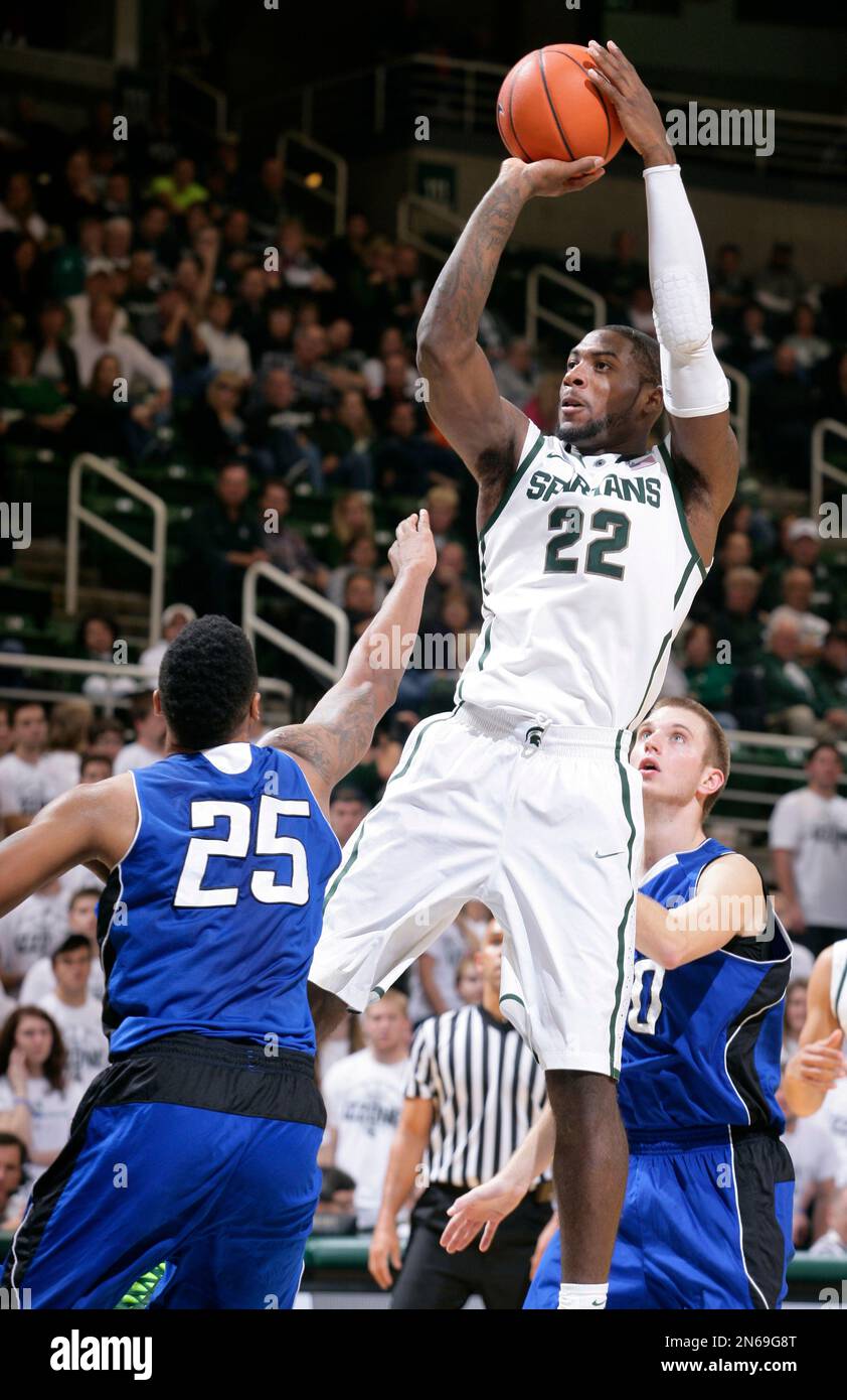 Michigan State's Branden Dawson (22) shoots over Grand Valley State's ...