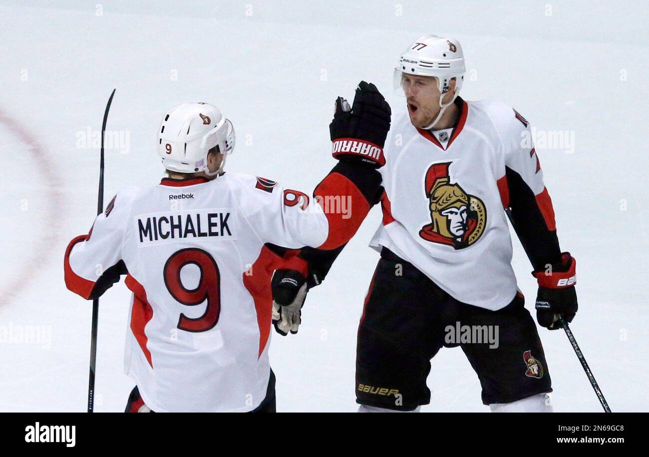 Ottawa Senators defenseman Joe Corvo (77) celebrates his goal with ...