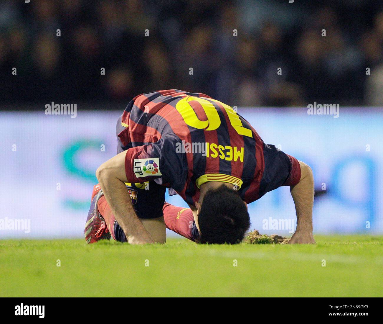 FC Barcelona's Lionel Messi from Argentina kneels during a Spanish La ...