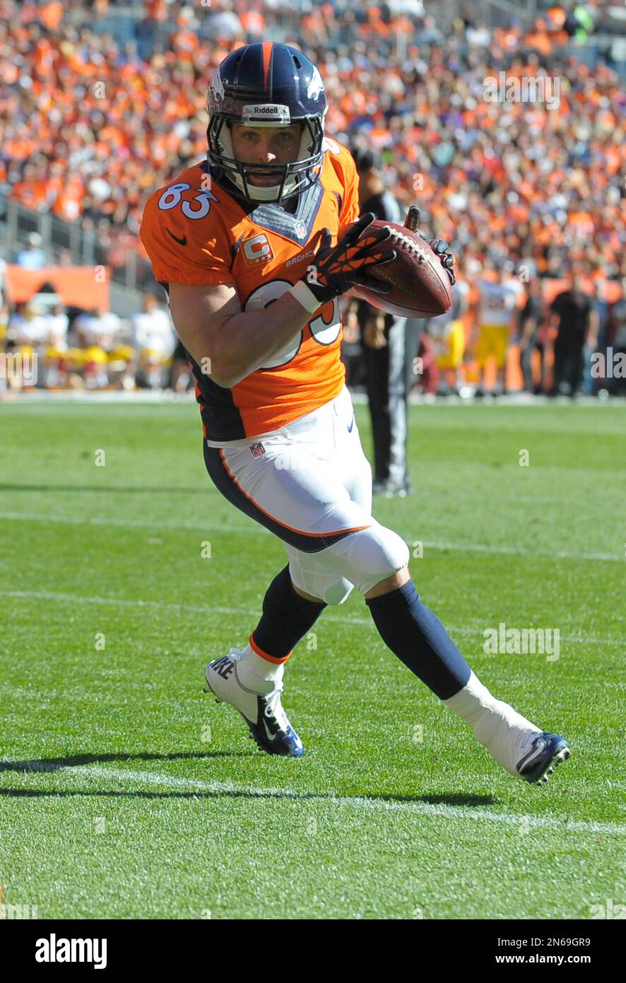 Denver Broncos wide receiver Wes Welker (83) catches a pass for a ...