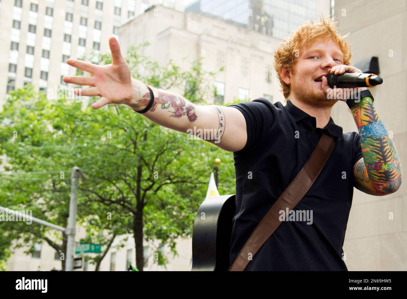 FILE - This July 12, 2013 file photo shows Ed Sheeran performing on NBC ...