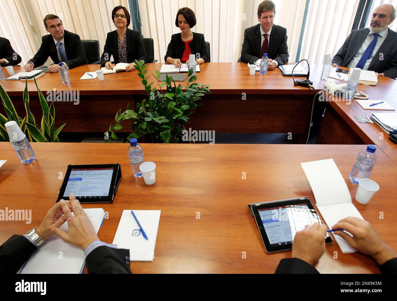 European Commission official Maarten Verwey, second right, Delia ...