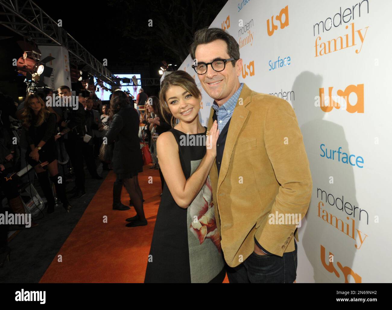 Cast members Sarah Hyland, left, and Ty Burrell attend USA Network's "Modern Family" Fan ...
