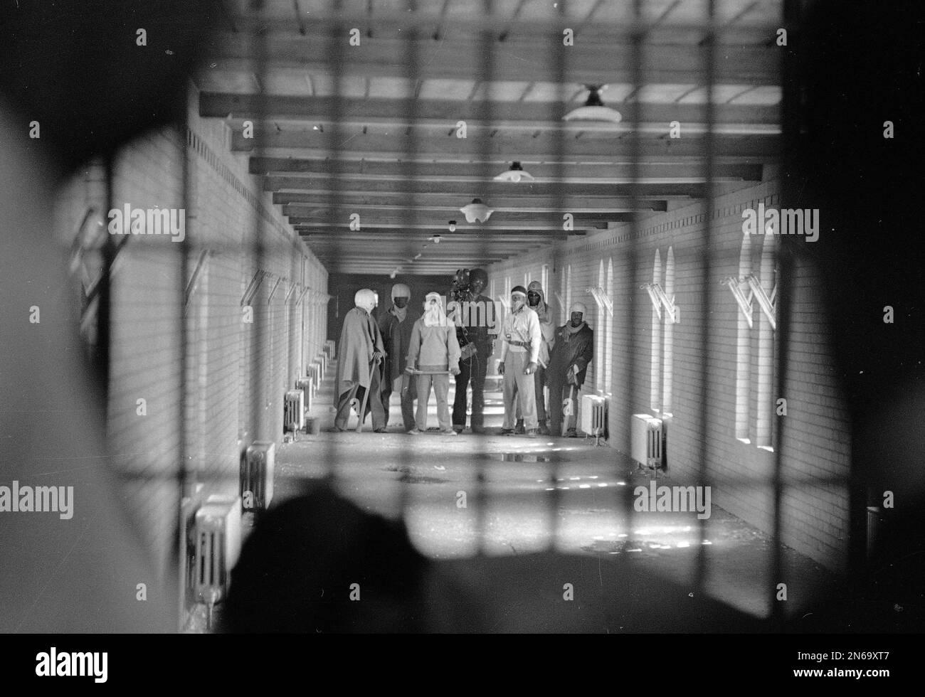 FILE - In this Sept. 10, 1971 file photo, inmates wearing cloaks and ...