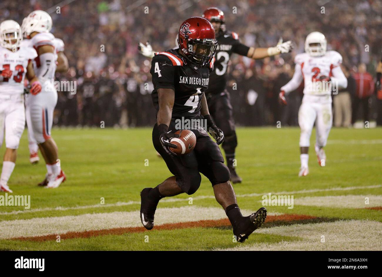 San Diego State running back Adam Muema (4) runs it in for a touchdown ...