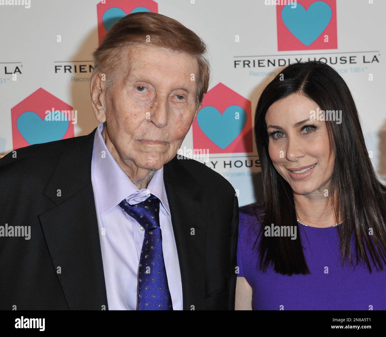 Sumner Redstone, left, and Sydney Holland arrive at the Friendly House ...