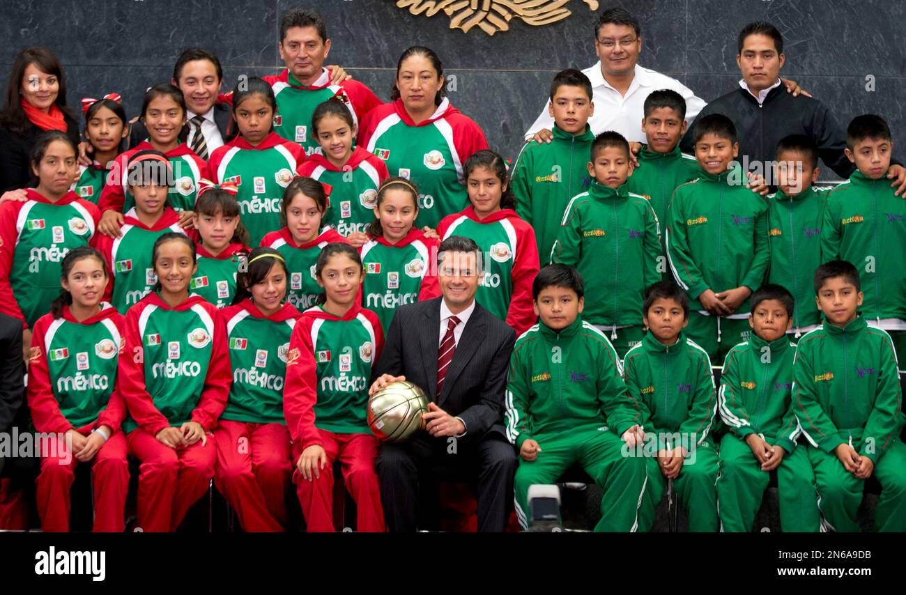Mexico's President Enrique Pena Nieto poses for photos with young ...
