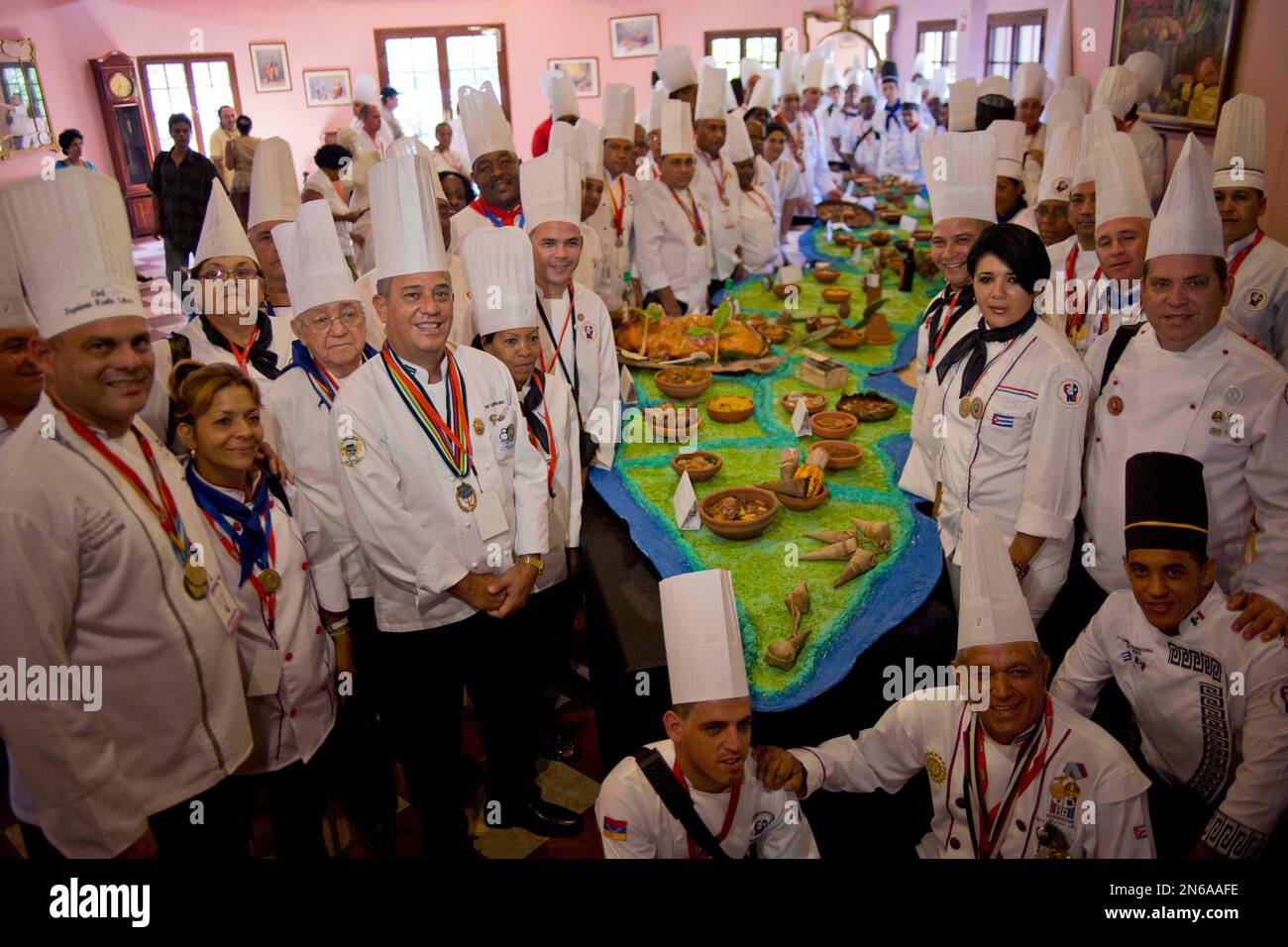 In this Oct. 18, 2013 photo, Chef Eddy Fernandez, fifth from left ...