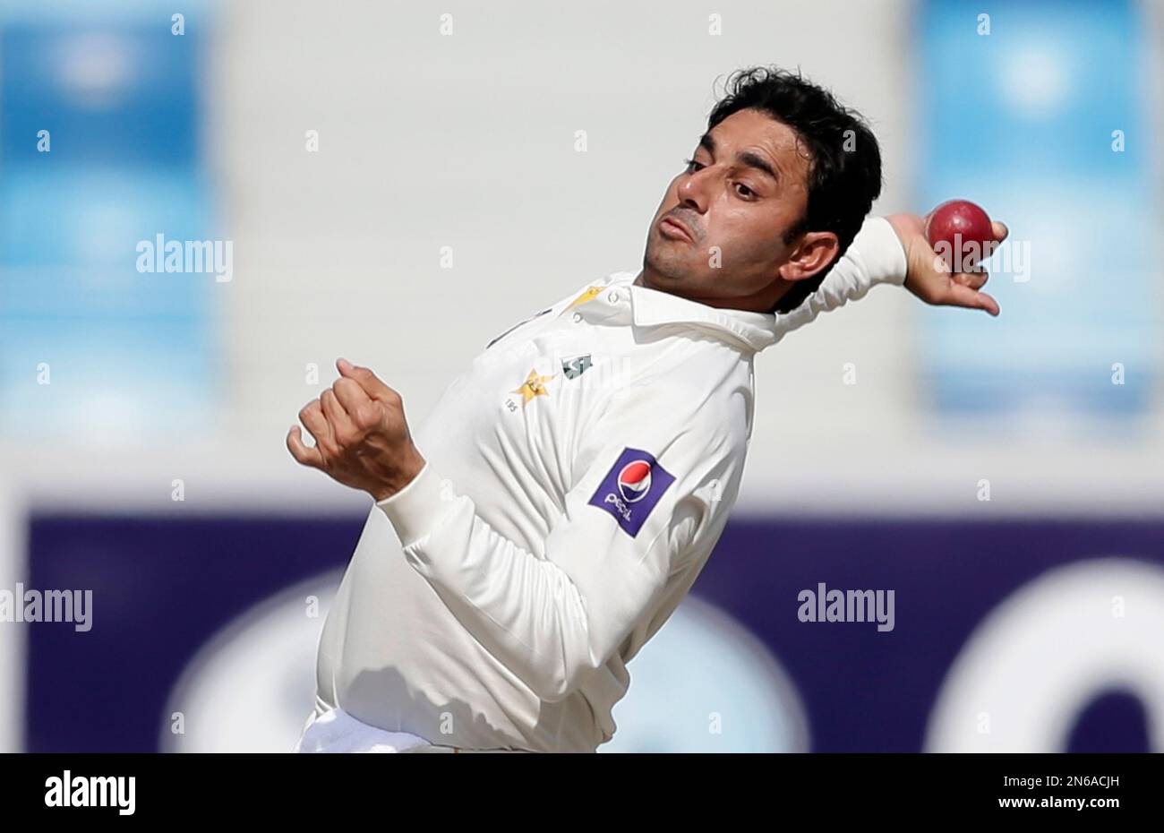 Pakistan’s bowler Saeed Ajmal, delivers a pitch during the third day of ...