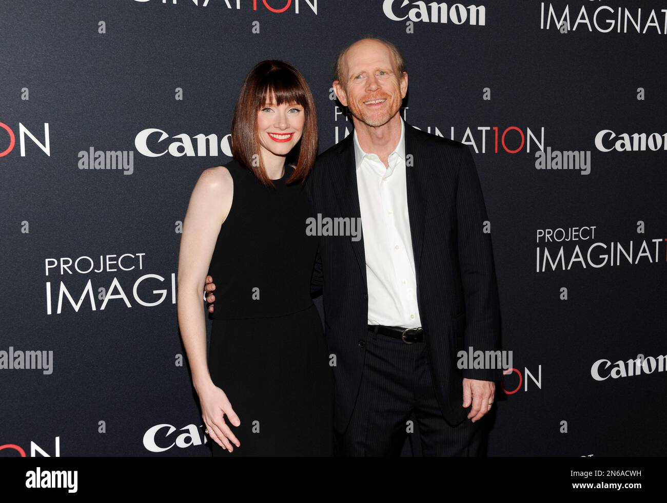 Actress Bryce Dallas Howard and her father, director Ron Howard, attend ...