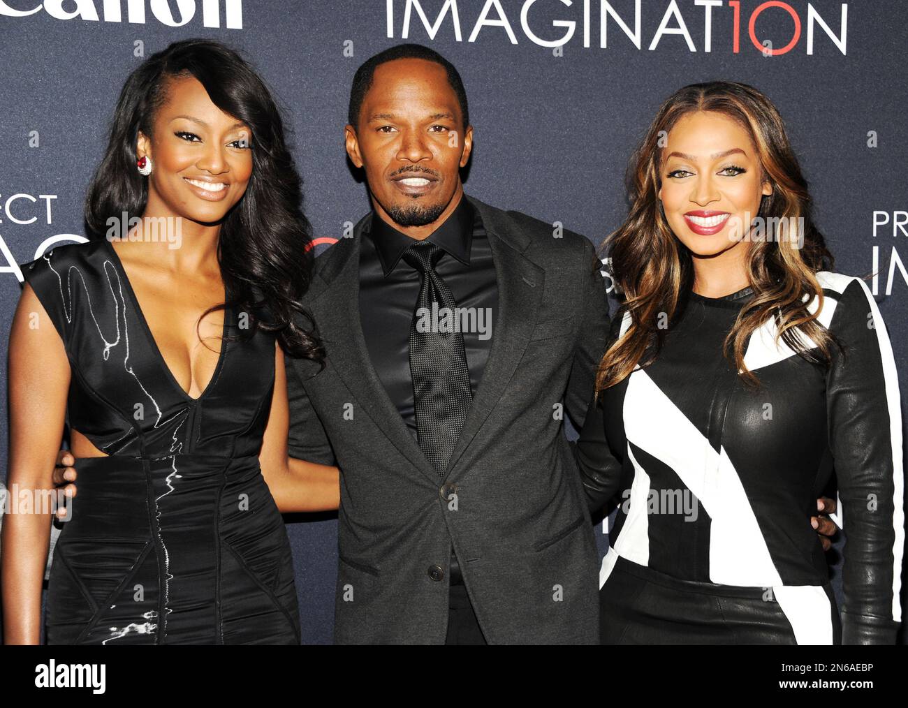 Actors Nichole Galicia, left, Jamie Foxx and La La Anthony attend the ...