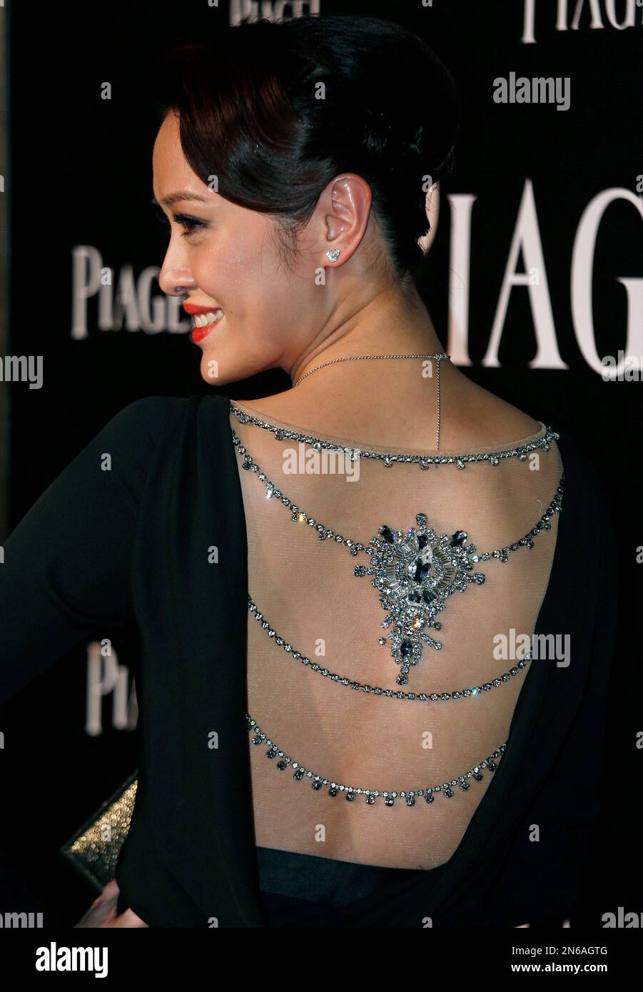 Hong Kong actress Anne Heung poses for photographers during a ...