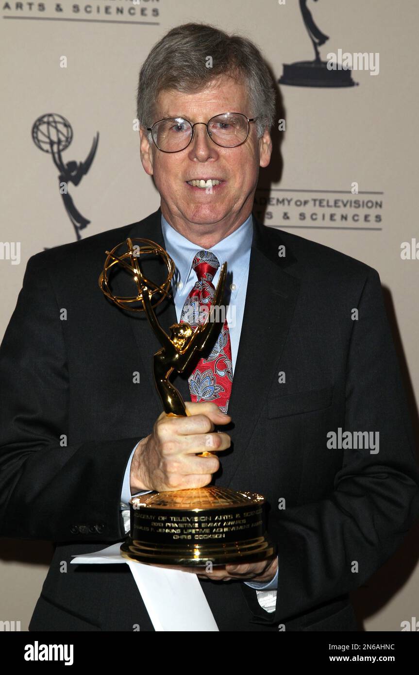 Chris Cookson poses with the Charles F. Jenkins Lifetime Achievement ...