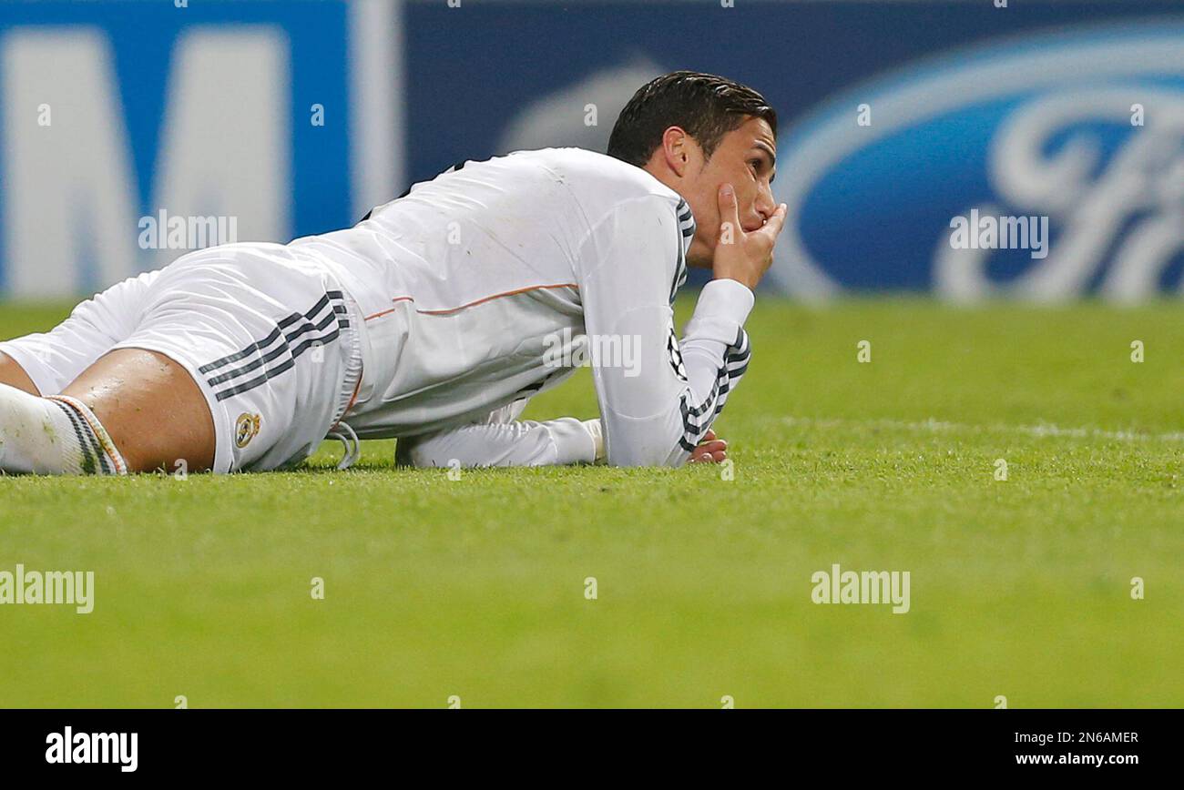 Real's Cristiano Ronaldo, reacts after a stronger tackle during a Group ...