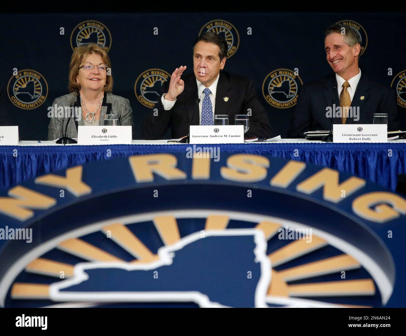 New York Gov. Andrew Cuomo, center, speaks during a NY Rising Community ...