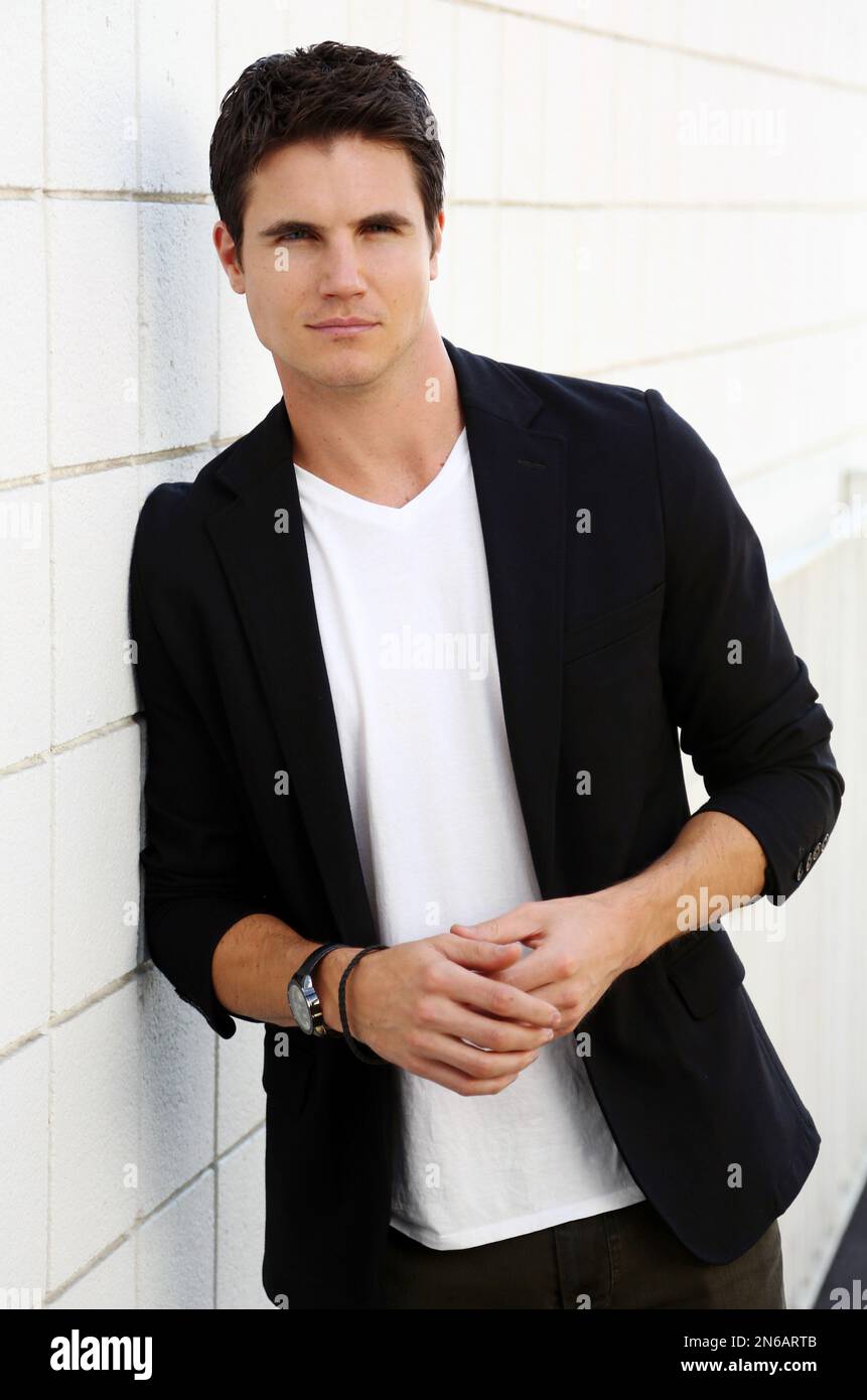 This July 29, 2013 photo shows actor Robbie Amell at the Beverly Hilton ...