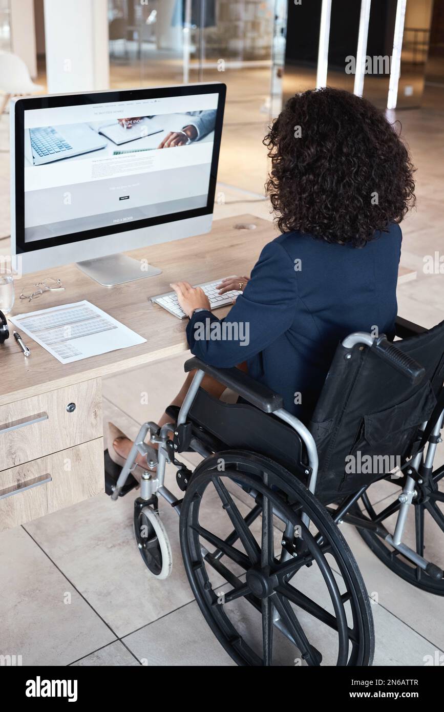 Business woman, wheelchair and disability of a database administrator ...