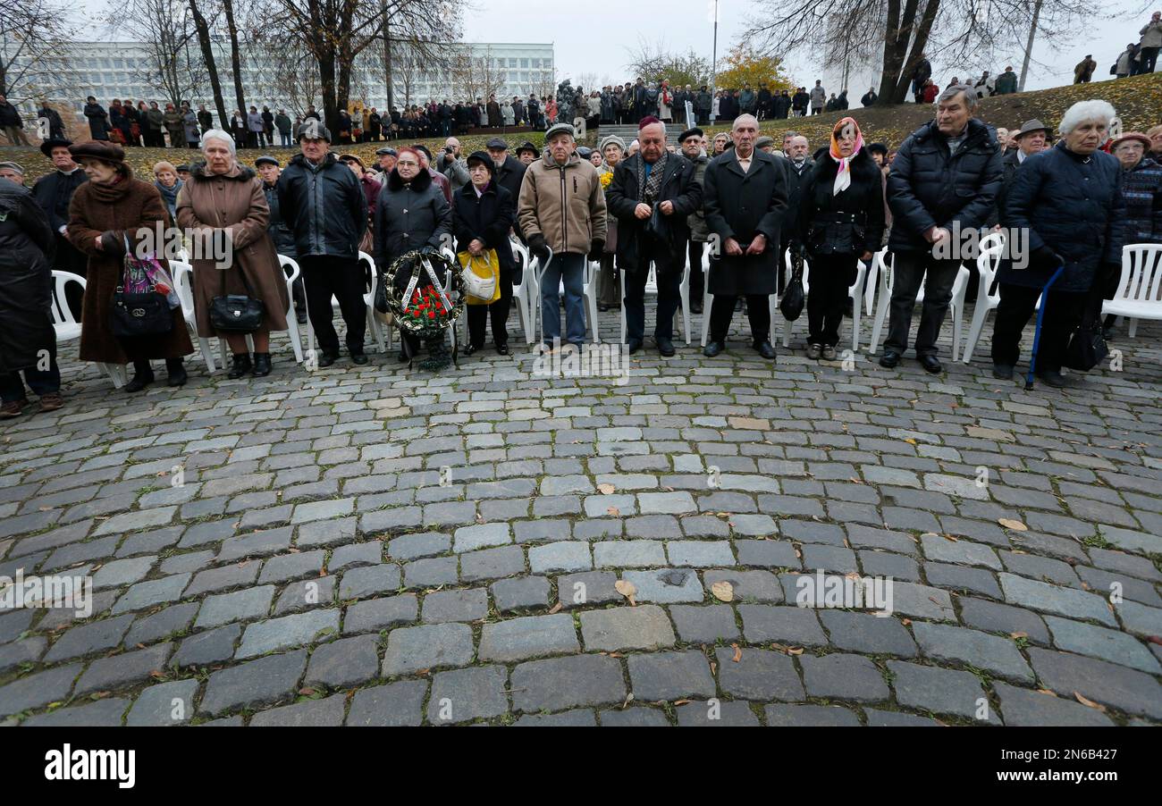 People attend a ceremony to commemorate the 70th anniversary of Minsk ...