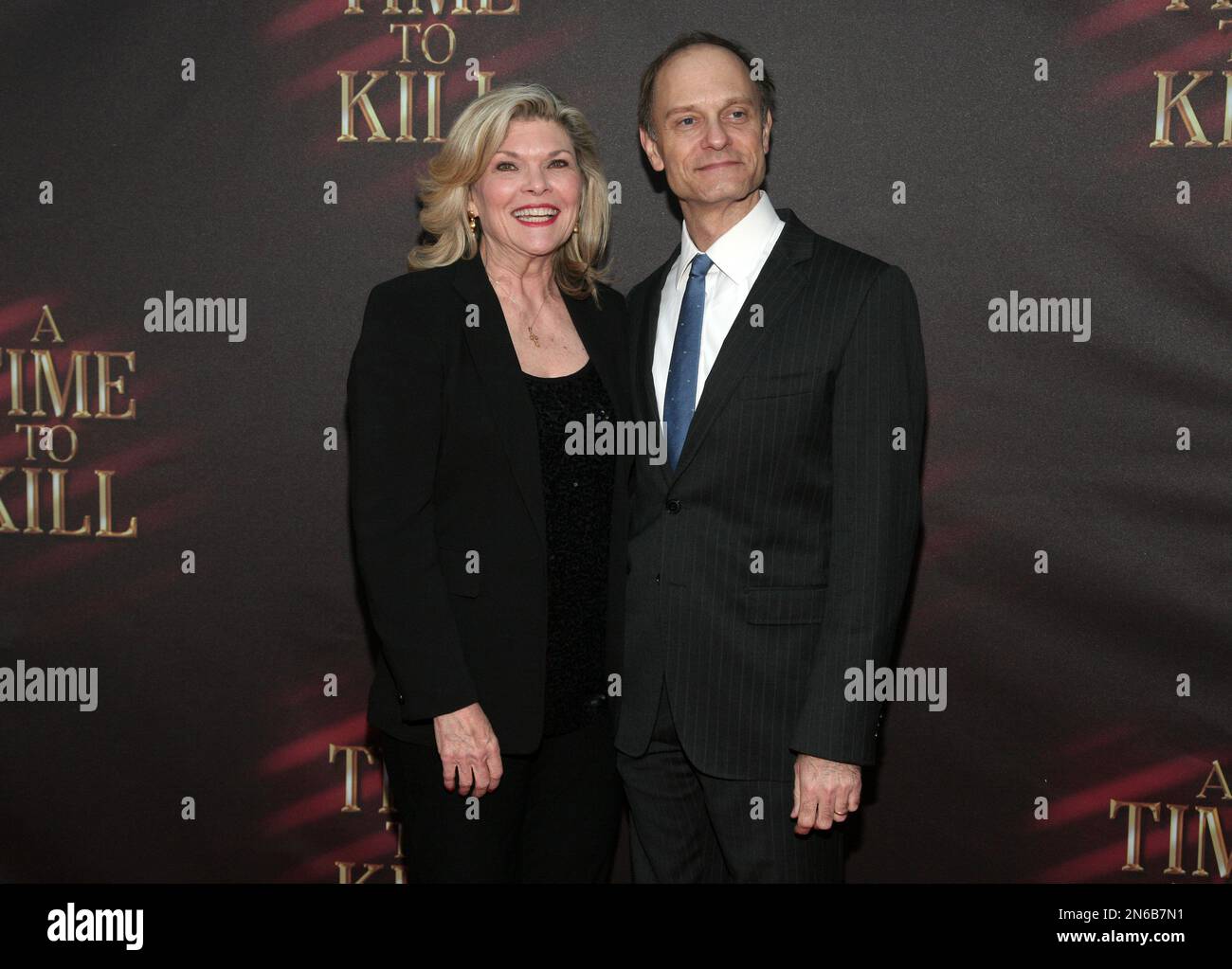 Actress Debra Monk, left, and actor David Hyde Pierce, right, attend ...