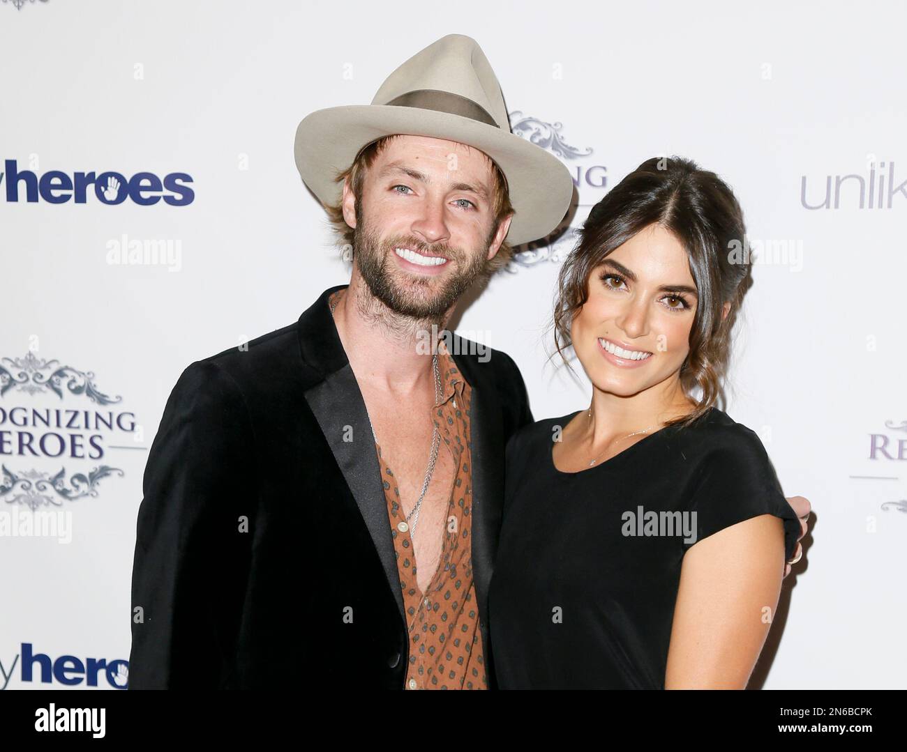 Actress Nikki Reed, right, and husband musician Paul McDonald, left ...