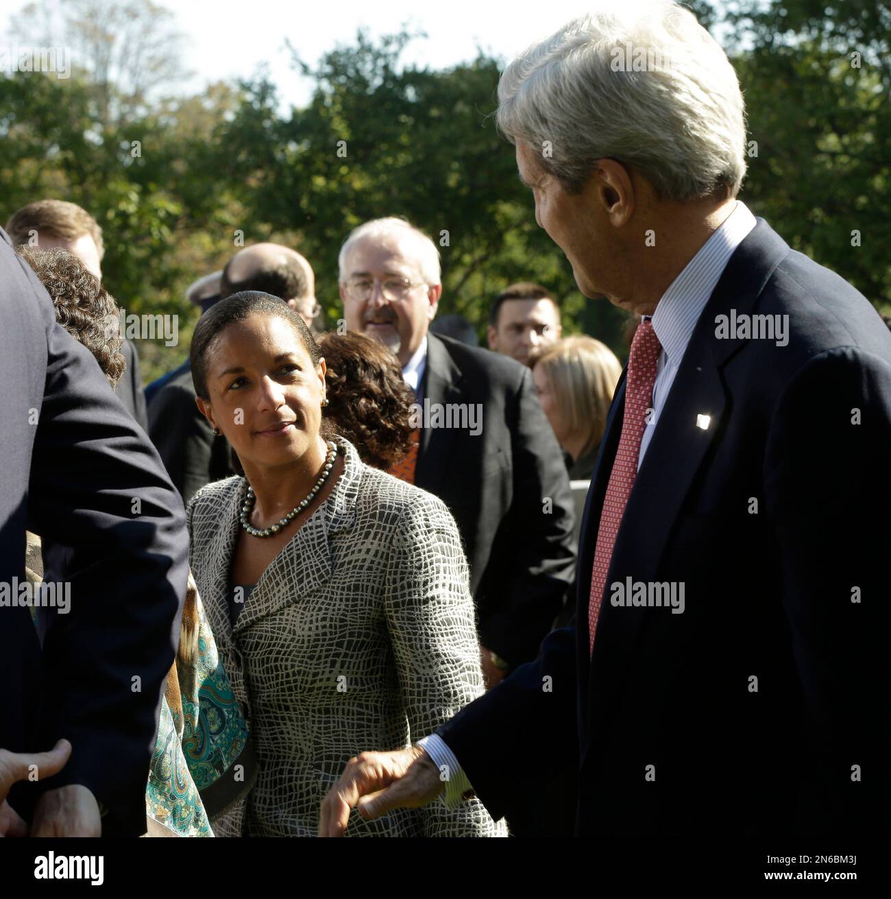 National Security Advisor Susan Rice, left, talks with Sec. of State ...