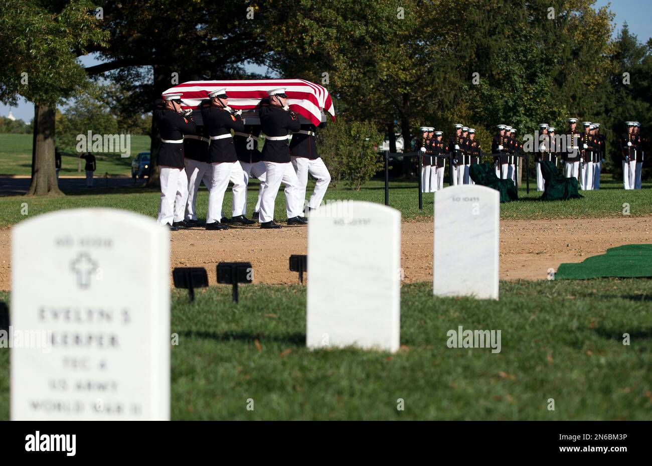 A Marine Honor Guard carries the casket of both World War II Marine Capt. Henry White and Marine ...