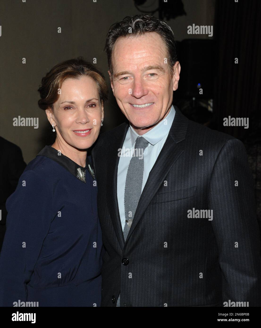 Bryan Cranston, right, and Robin Dearden attend the CoachArt 2013 Gala ...