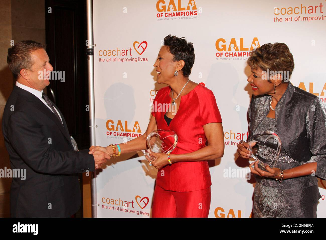 From left Jeremy Zimmer, CEO and co-founder of UTA, Robin Roberts and ...