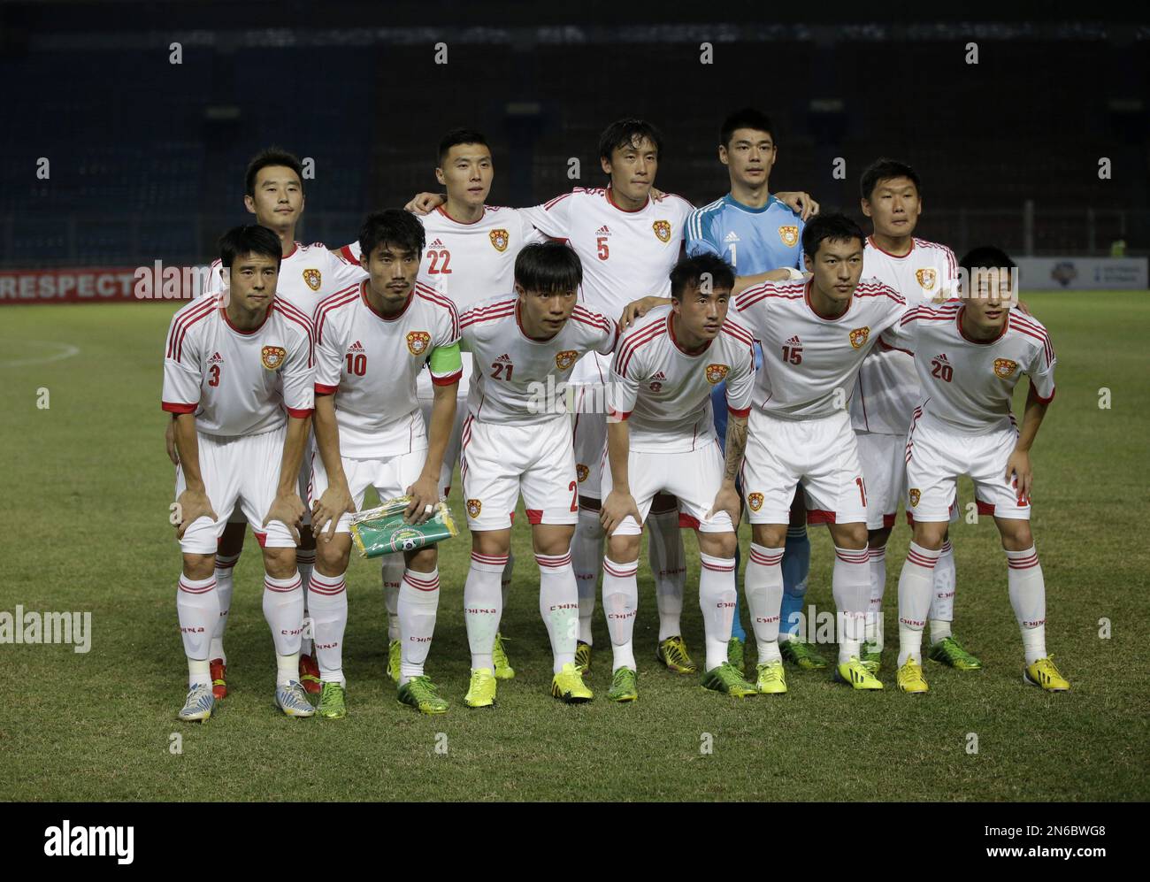 China's team pose for photographers for a team photo before the start ...