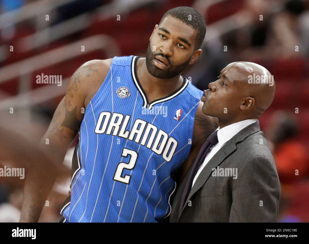 Orlando Magic coach Jacque Vaughn talks with Kyle O'Quinn during the ...