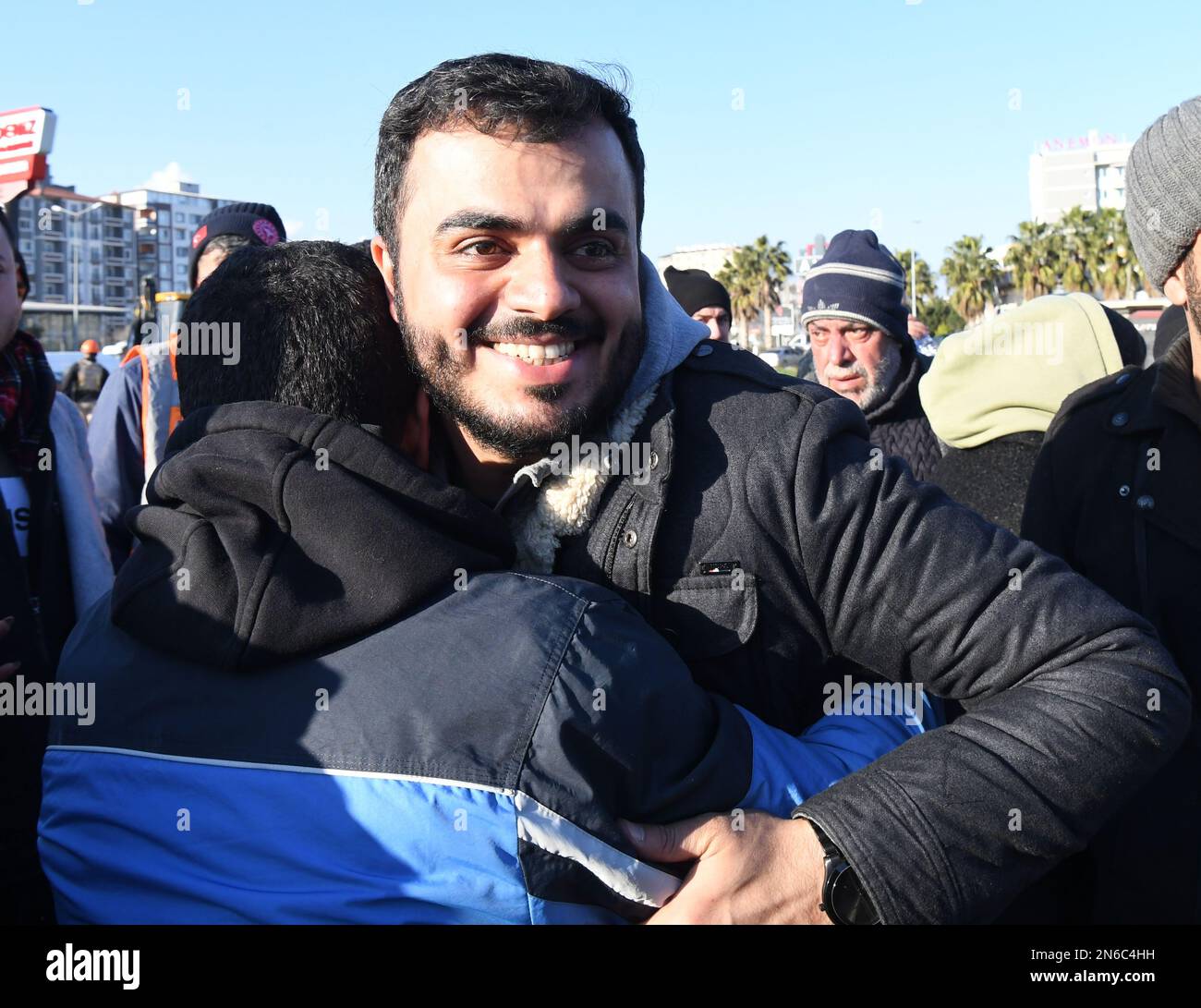 Antakya, T¨¹rkiye. 9th Feb, 2023. Relatives of a woman survivor hug ...