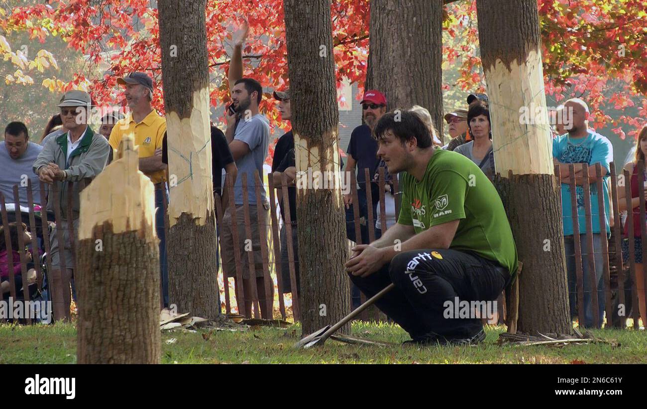 Lumberjack and U.S. team member Matt Cogar takes a break after ...