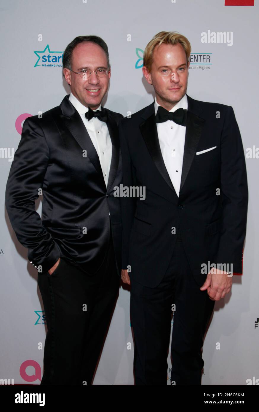 Andrew Saffir and Daniel Benedict arrive at the Elton John AIDS ...