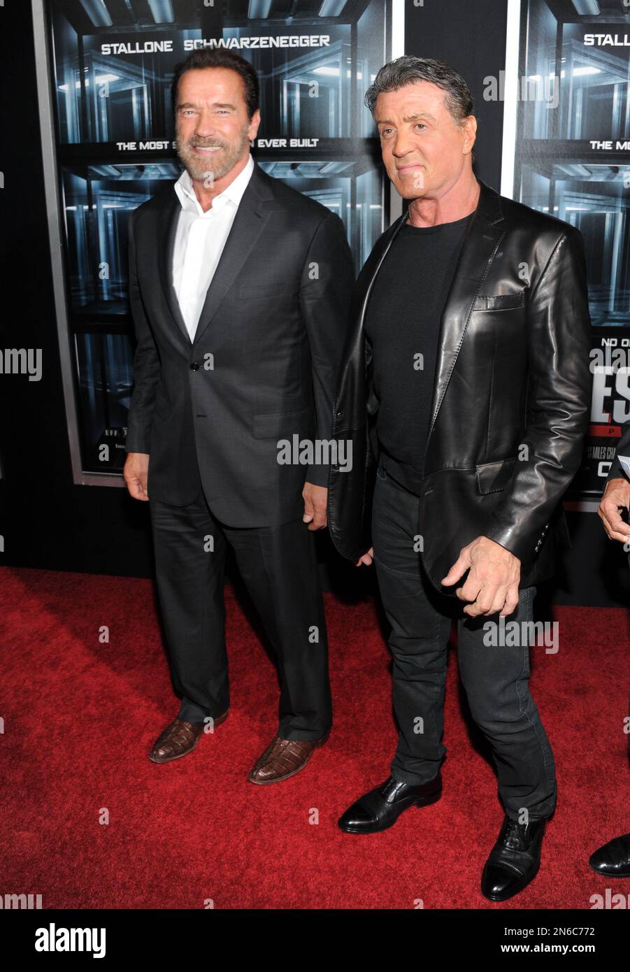 Actor Arnold Schwarzenegger, left, and Sylvester Stallone attend the ...