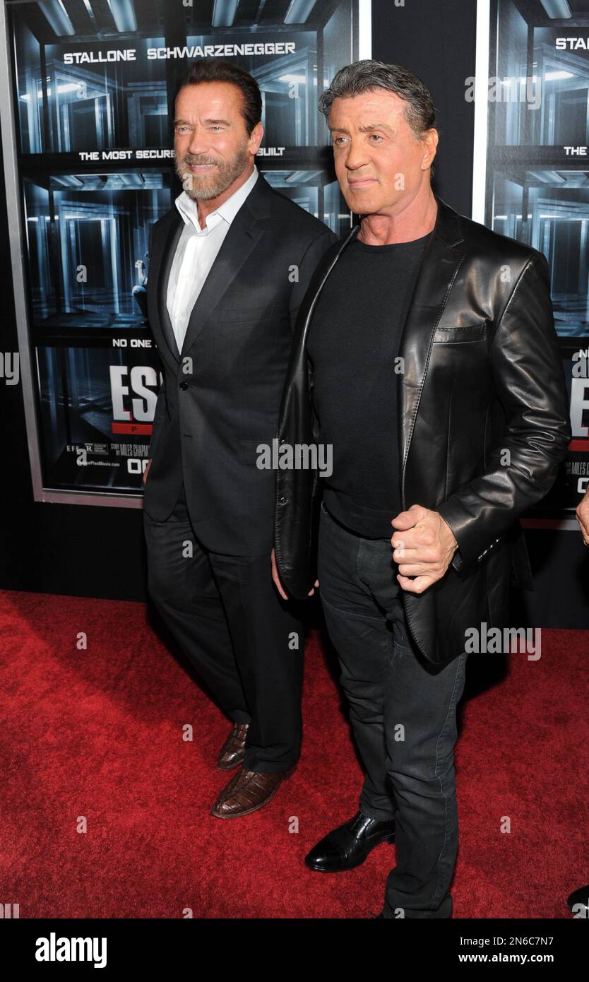 Actor Arnold Schwarzenegger, left, and Sylvester Stallone attend the ...