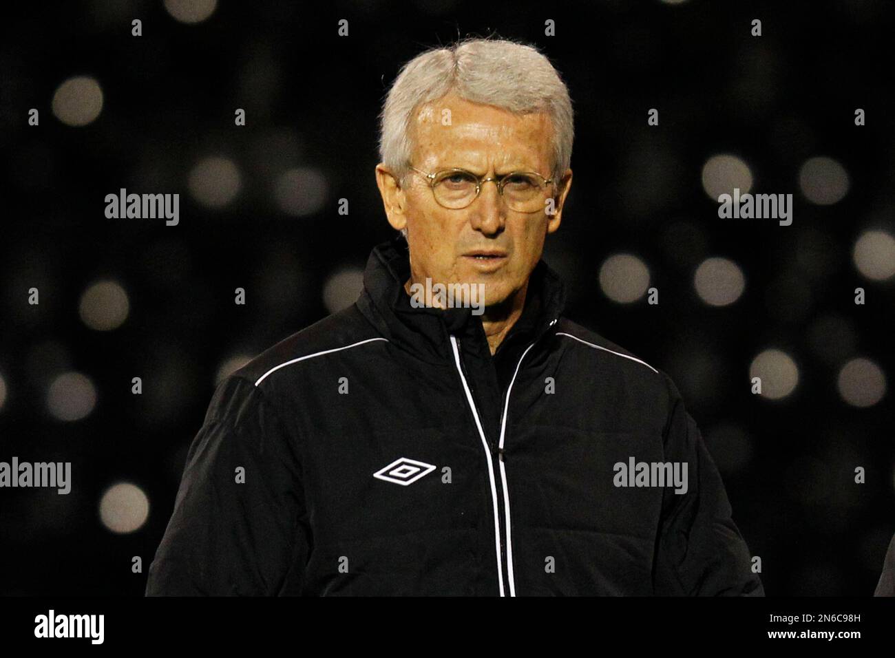 Canada's head coach Benito Floro arrives at the dugout before the start ...
