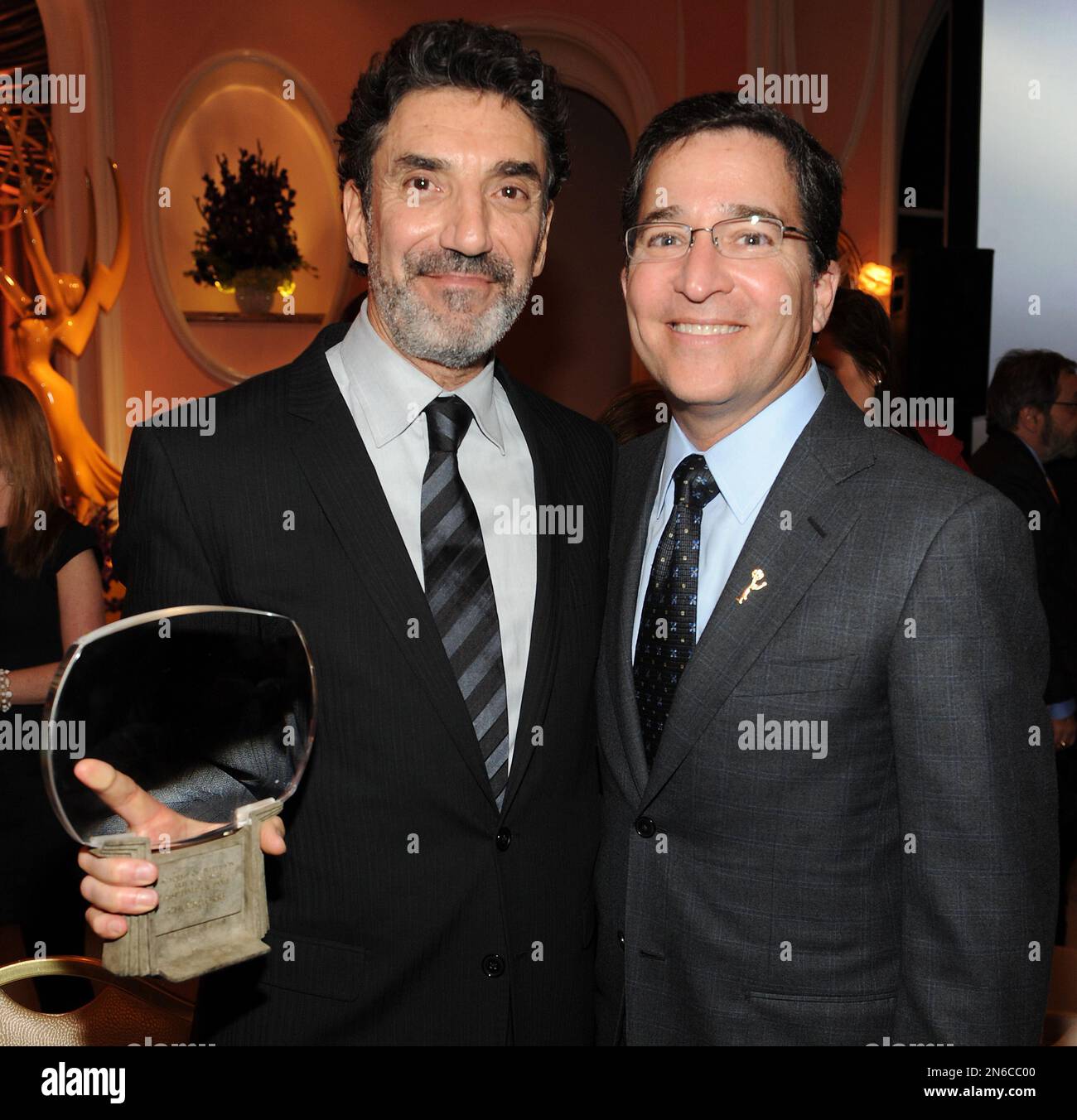 BEVERLY HILLS, CA - MARCH 1: (L-R) Chuck Lorre and Bruce Rosenblum, CEO ...