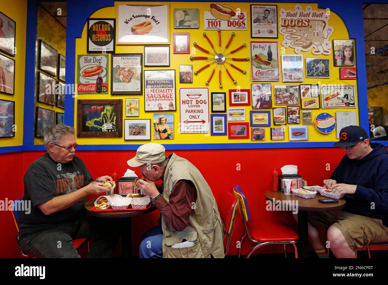 In this Oct. 9, 2013, photo, customers enjoy their meals at Doug Sohn's ...