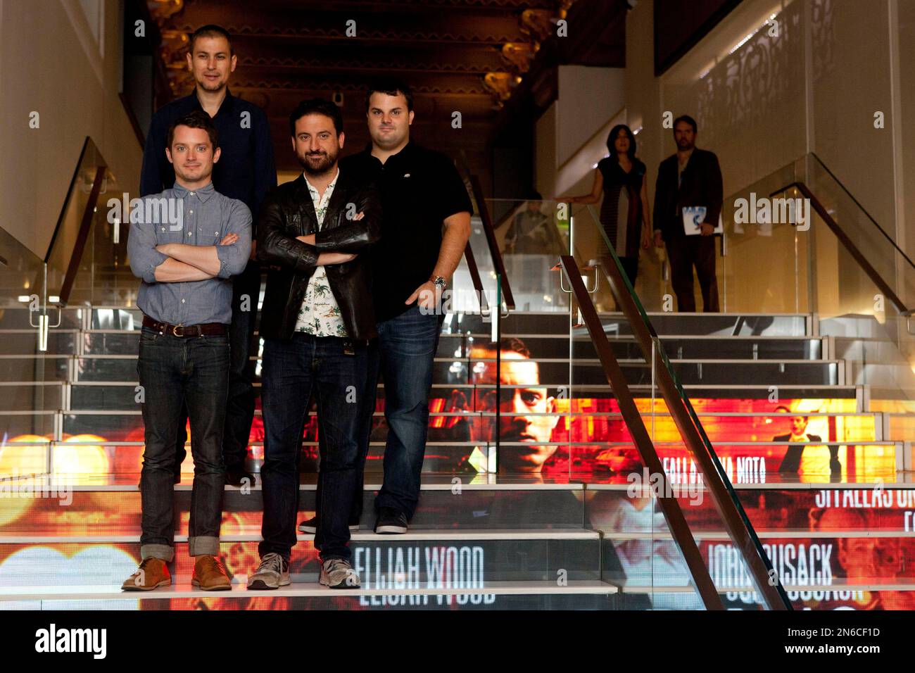 (L-R) Producer Adrian Guerra, U.S. actor Elijah Wood, producer Rodrigo ...