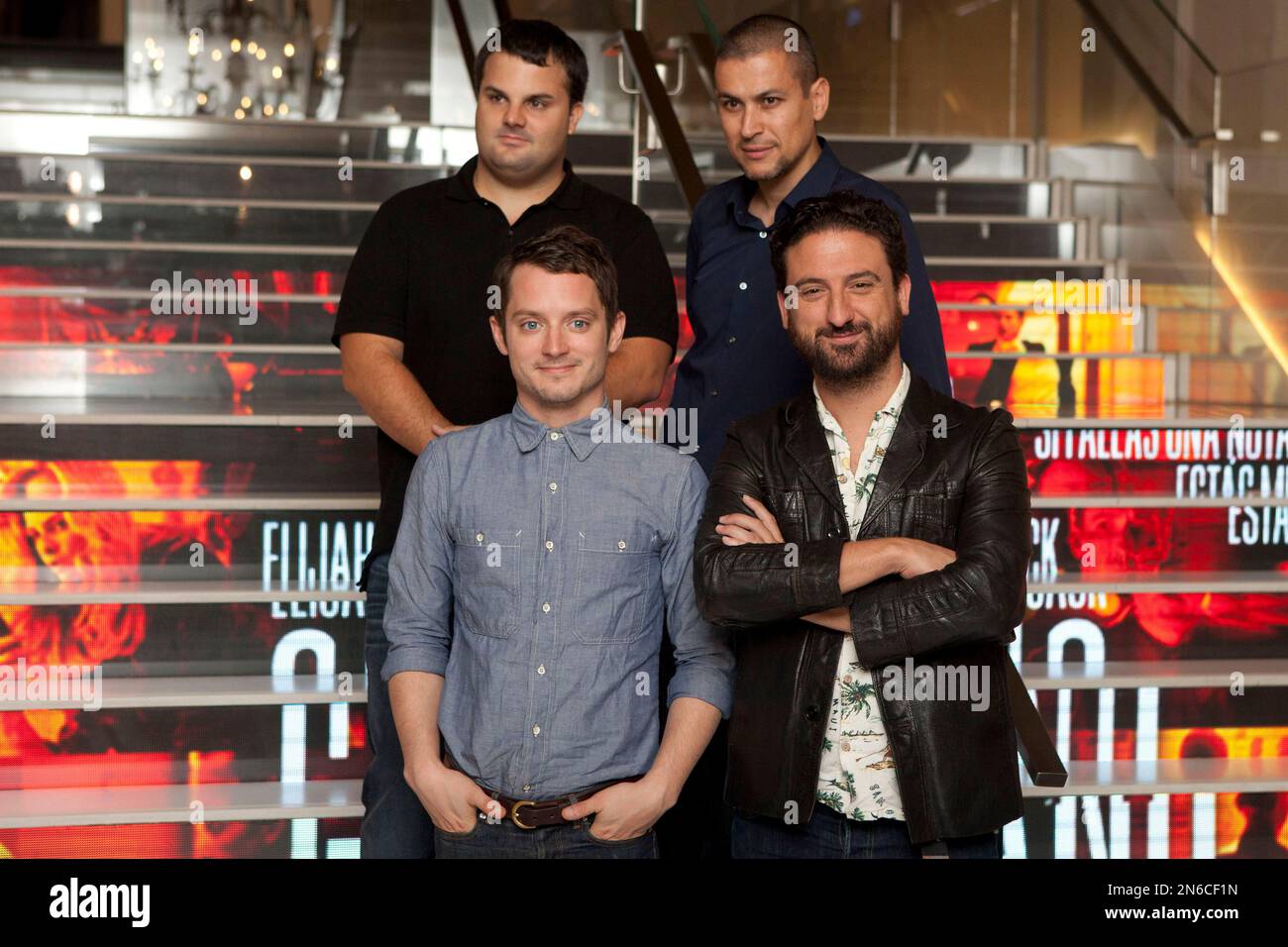 (L-R) Producer Adrian Guerra, U.S. actor Elijah Wood, producer Rodrigo ...