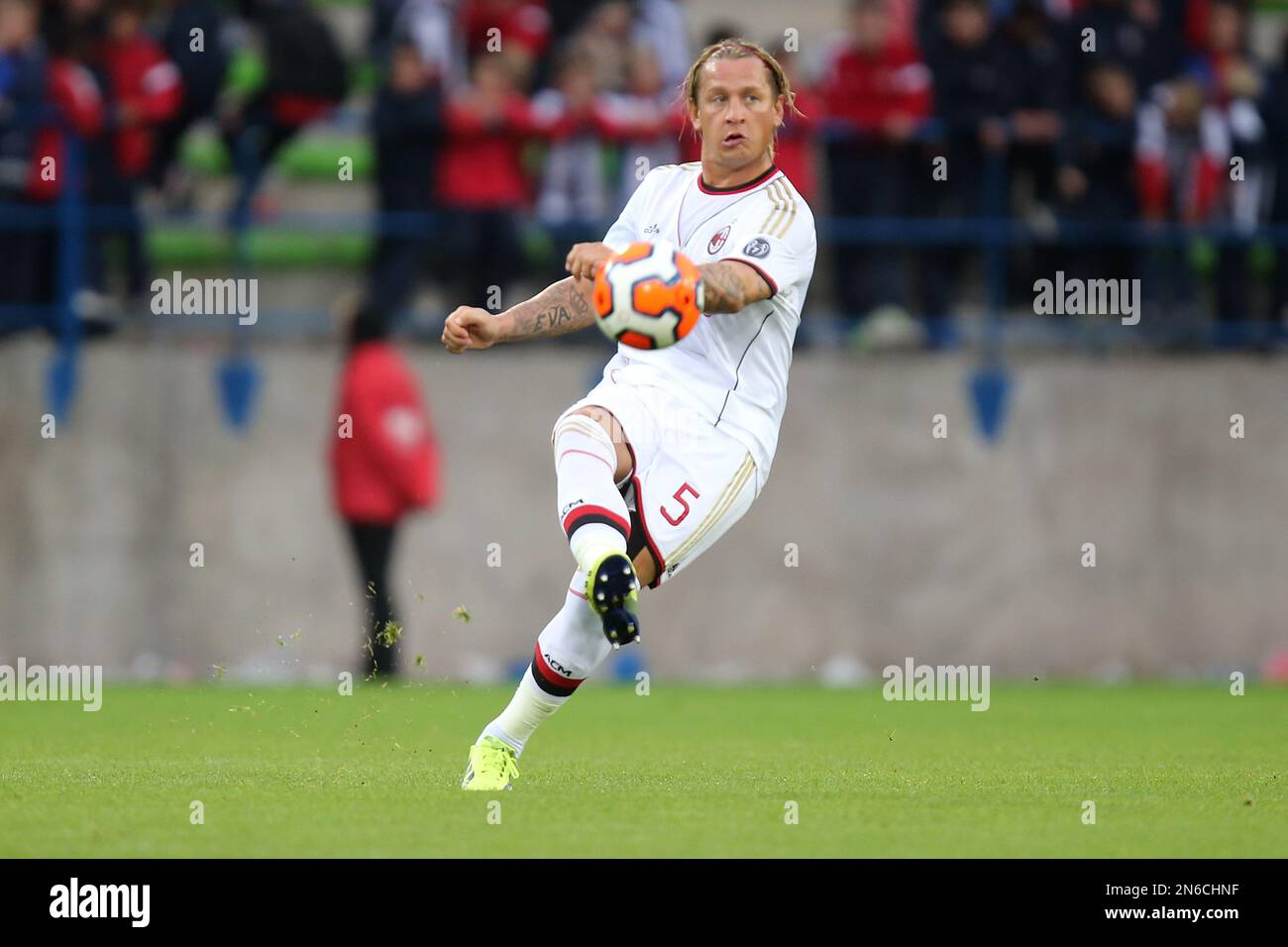 French defender of AC Milan Philippe Mexes kicks the ball during his ...