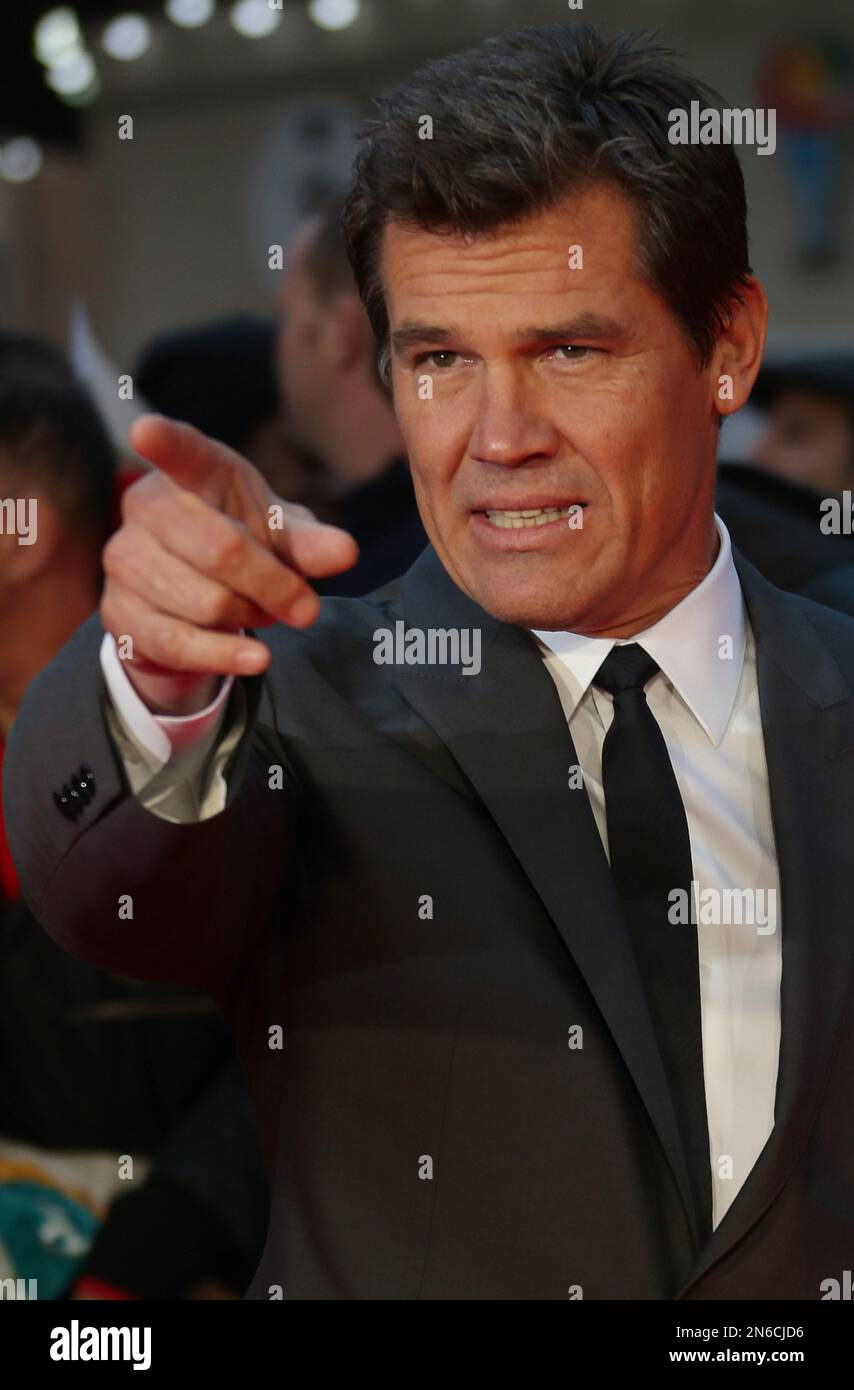 U.S actor Josh Brolin points as he arrives on the red carpet for the ...