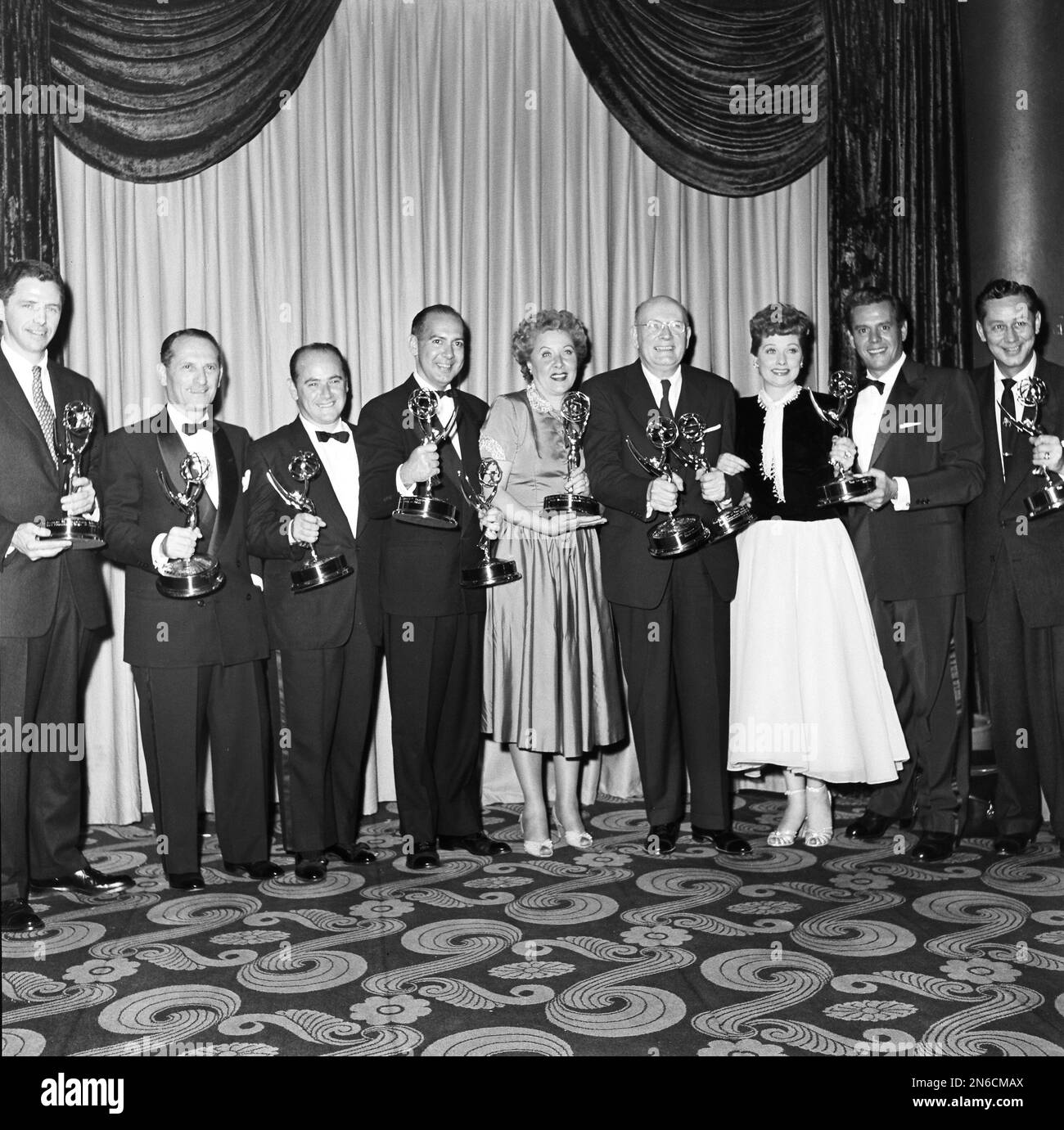 HOLLYWOOD, CA - FEBRUARY 11, 1954: Winner for Best Comedy Show for "I Love Lucy," (fourth from ...