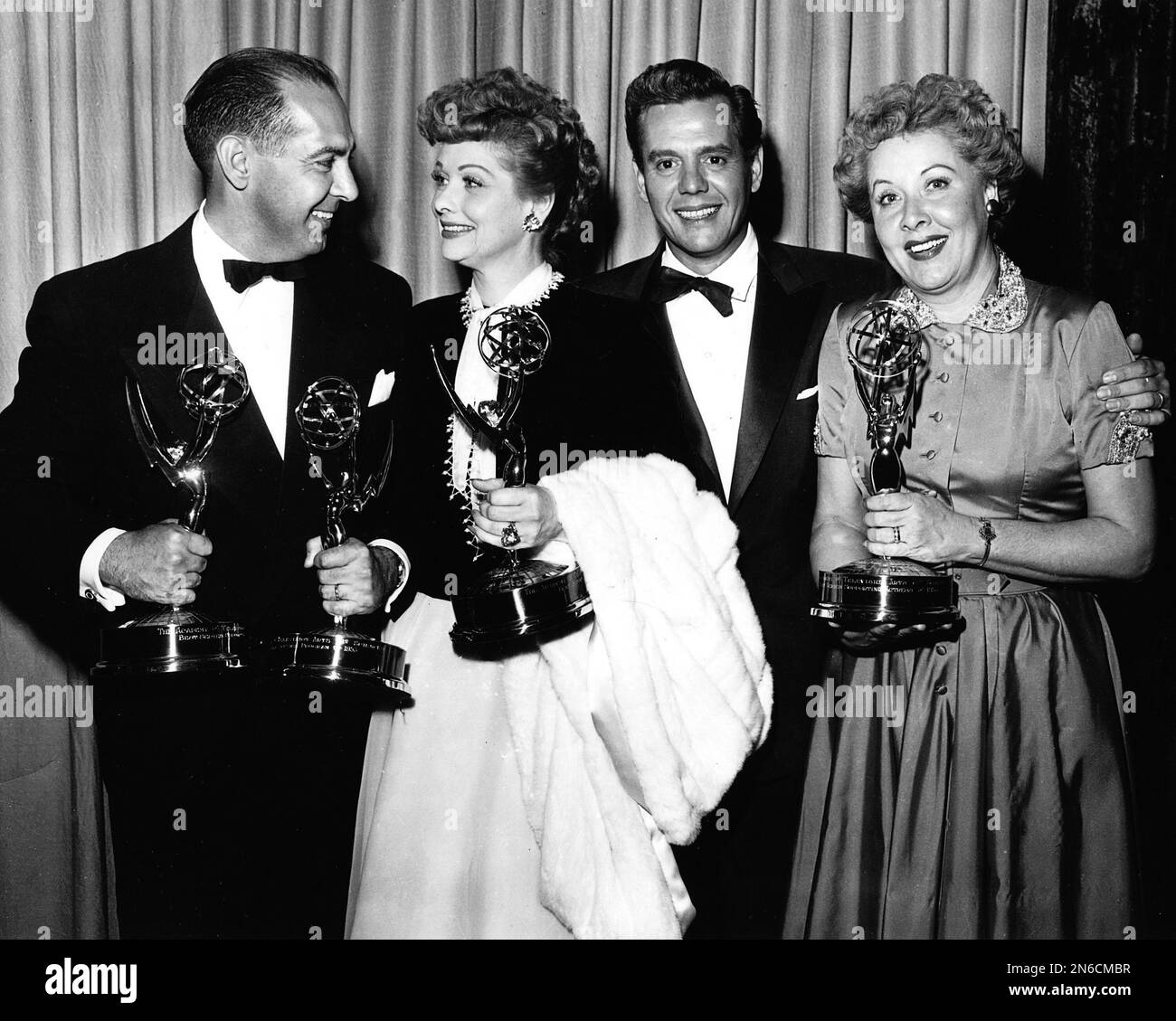 HOLLYWOOD, CA - FEBRUARY 11,1954: (L-R) CBS program chief Harry Ackerman with "I Love Lucy" co ...