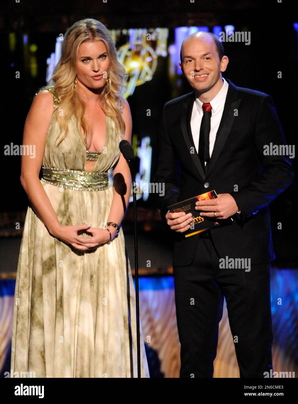 LOS ANGELES, CA - SEPTEMBER 10: (L-R) Rebecca Romijn, Paul Scheer ...