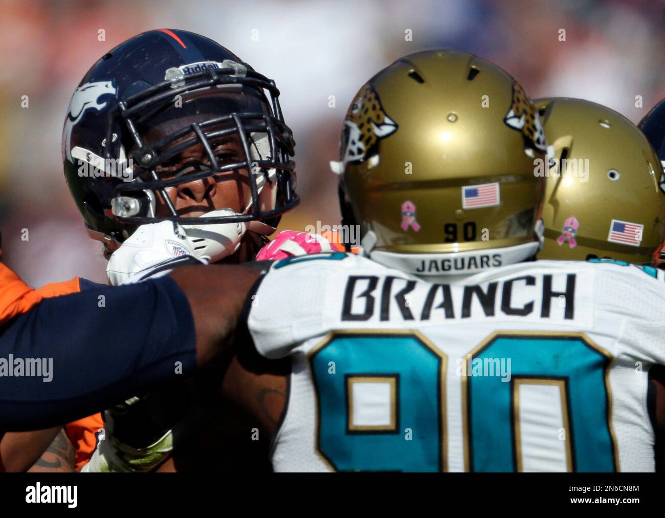 Jacksonville Jaguars defensive end Andre Branch (90) hits Denver ...
