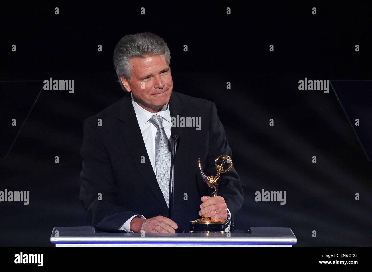 NORTH HOLLYWOOD, CA - AUGUST 06: Chuck Henry of NBC4 presents an award ...