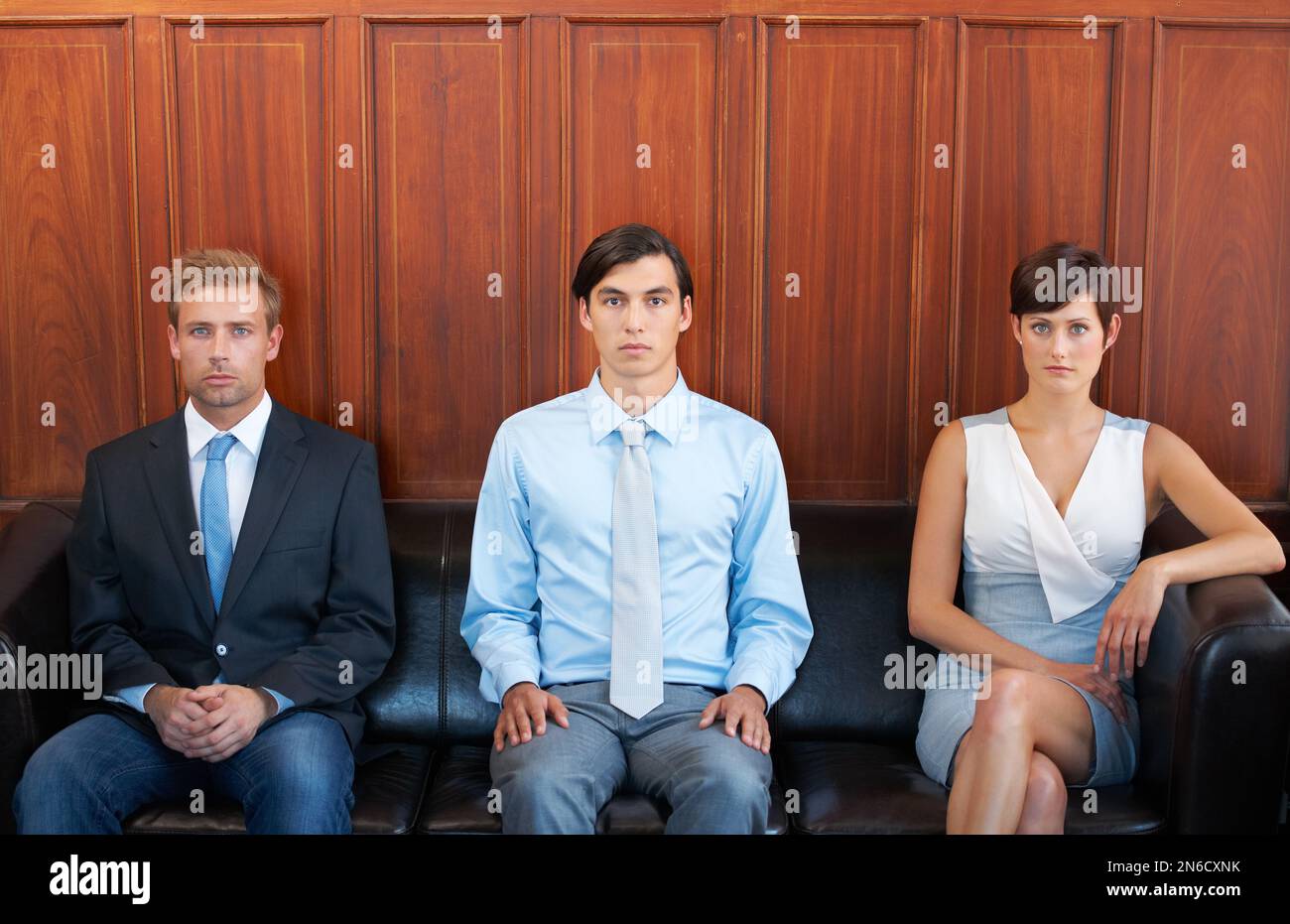 Anxious moments before the interview. Portrait of three young people ...